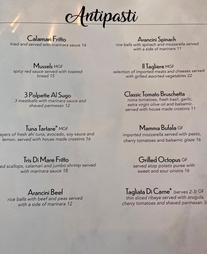 The antipasti menu reads like a love letter to Italian appetizers – from classic calamari to arancini that would make a Sicilian grandmother weep with joy.