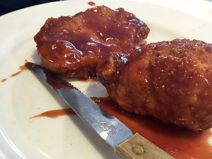 These pork chops aren't just broasted, they're transformed &ndash; wearing their sauce like a glossy magazine cover model.