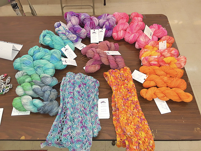 A color wheel of hand-dyed yarns that would make any knitter weak in the knees&mdash;each skein a promise of cozy creations to come.