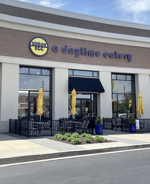 Bright umbrellas and welcoming windows promise the kind of breakfast experience that brightens any Kansas morning.