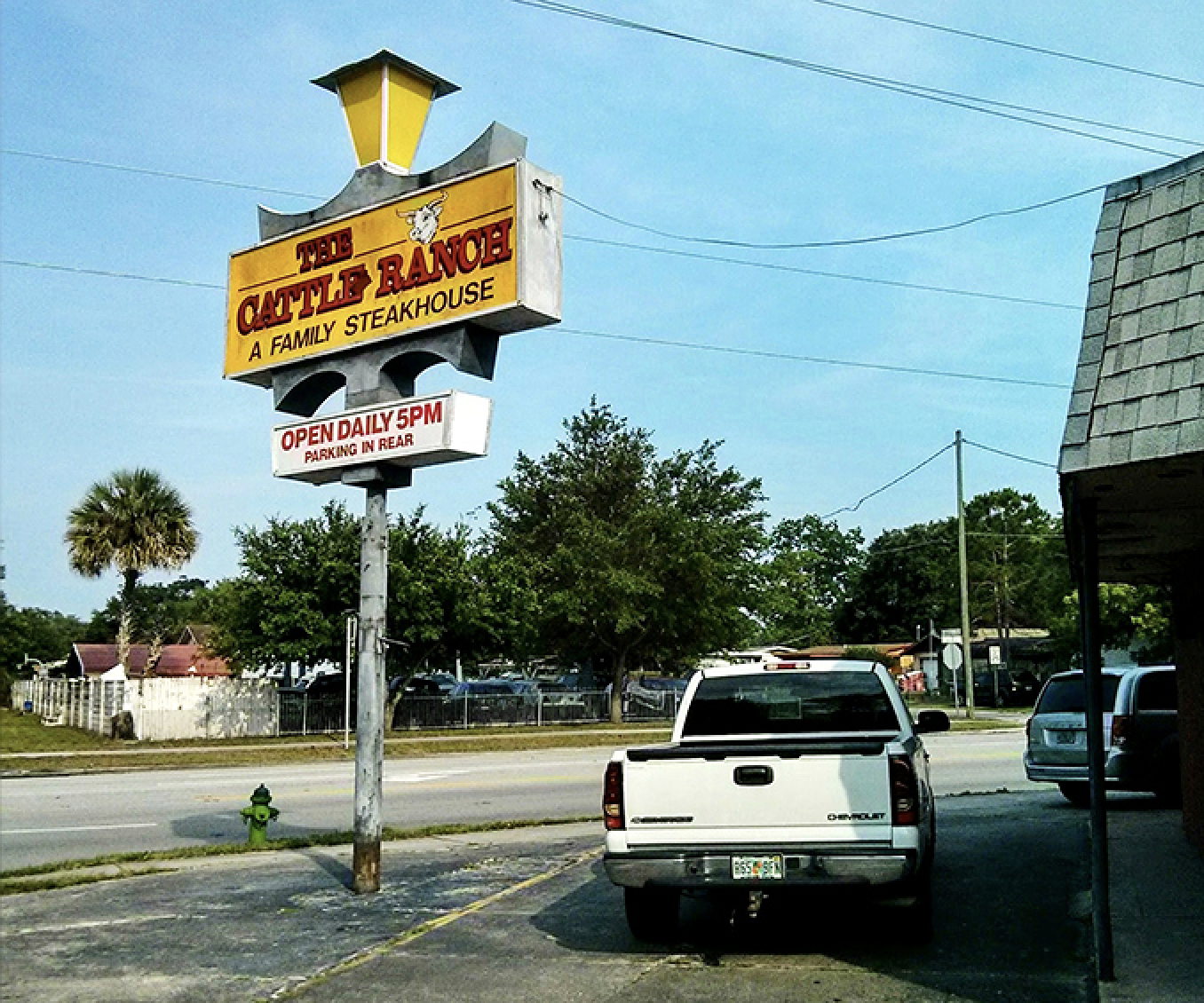 That vintage yellow sign has been guiding hungry families to steak nirvana since bell-bottoms were first in fashion.