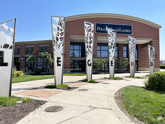 The iconic entrance to Polo Ralph Lauren at Tanger Outlets, where those metal "LEGEND" pillars practically whisper "your credit card is about to have an adventure."