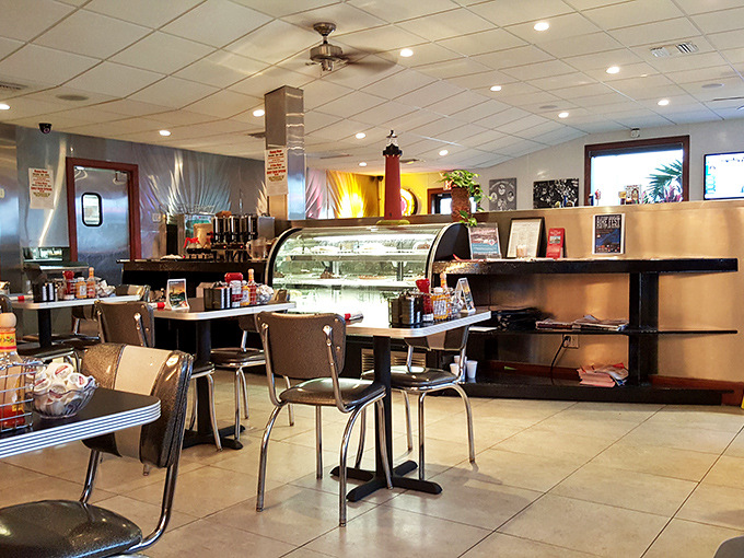 Classic diner charm meets Florida casual inside, where chrome accents gleam and ceiling fans keep the conversation as cool as the atmosphere.