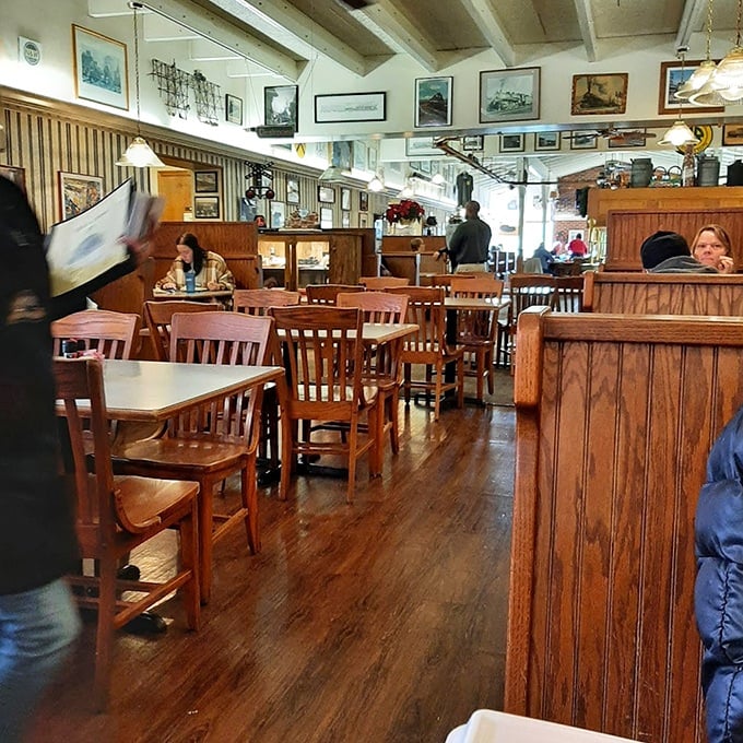 The dining room has that "everybody knows your name" feeling. Wood paneling and railroad memorabilia create the perfect backdrop for comfort food communion.