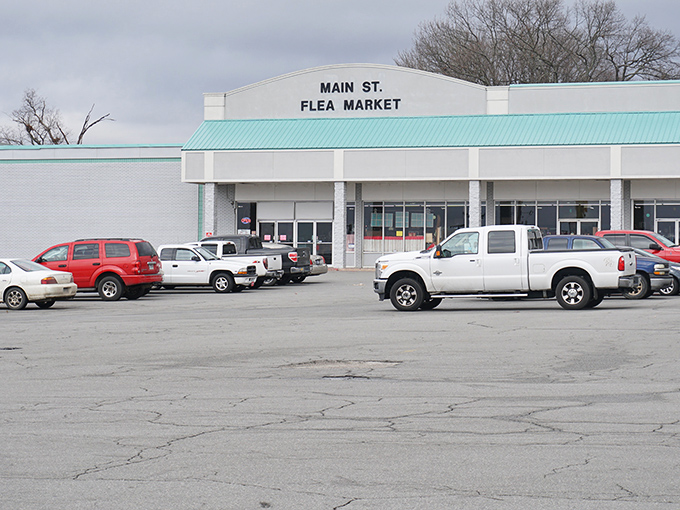 The unassuming exterior of West Main Street Flea Market beckons with the promise of treasures waiting inside. Weekend warriors, your hunting grounds await!