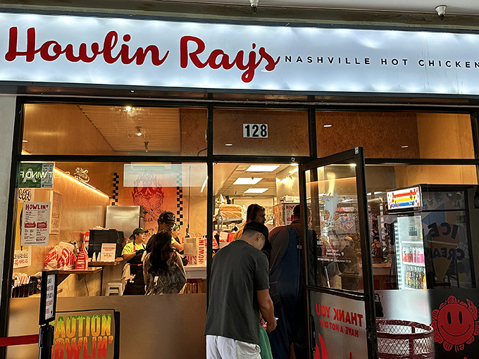 The pilgrimage begins here: Howlin' Ray's storefront in Chinatown's Far East Plaza, where the line forms early and the anticipation builds with every step closer.
