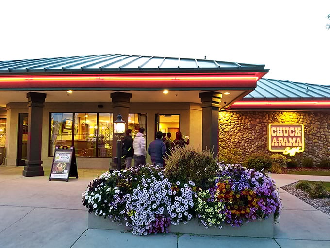 The welcoming stone facade of Chuck-A-Rama beckons hungry Idahoans like a beacon of comfort food paradise, complete with colorful flower displays.