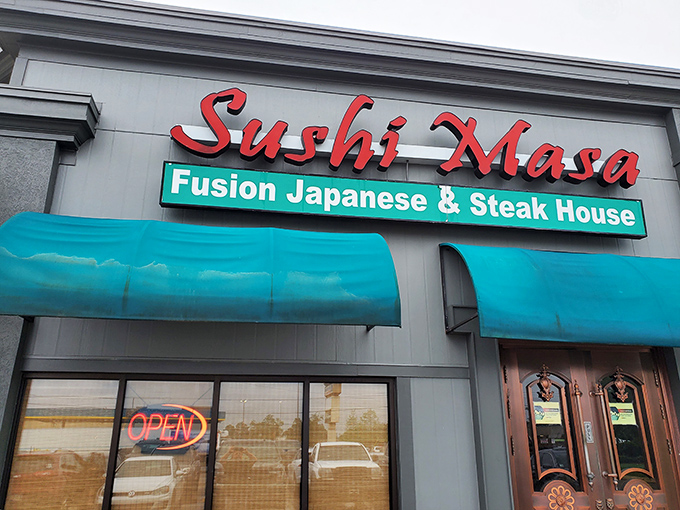 The bright red "Sushi Masa" sign beckons like a lighthouse for hungry souls navigating the sea of Baton Rouge dining options.
