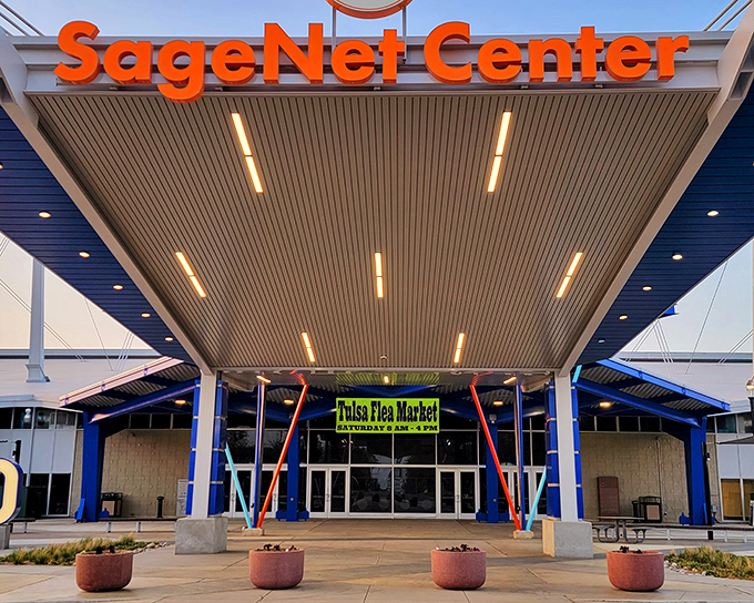 Treasure hunters navigate the concrete jungle of the Tulsa Flea Market, where one person's forgotten knickknack becomes another's prized possession. 