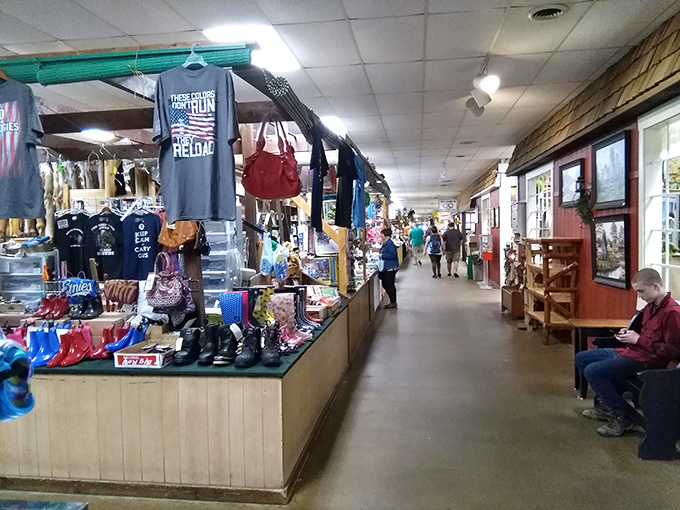 The indoor corridors of Green Dragon Market offer a treasure hunter's paradise where patriotic t-shirts hang alongside handbags, creating a retail adventure unlike any mall experience.