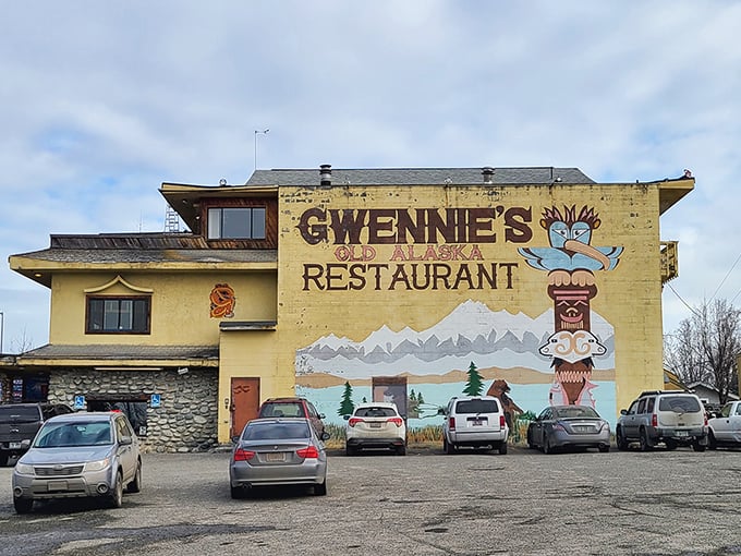 Gwennie's exterior stands proud against Alaska's blue sky, its mural promising authentic frontier flavors before you even step inside.