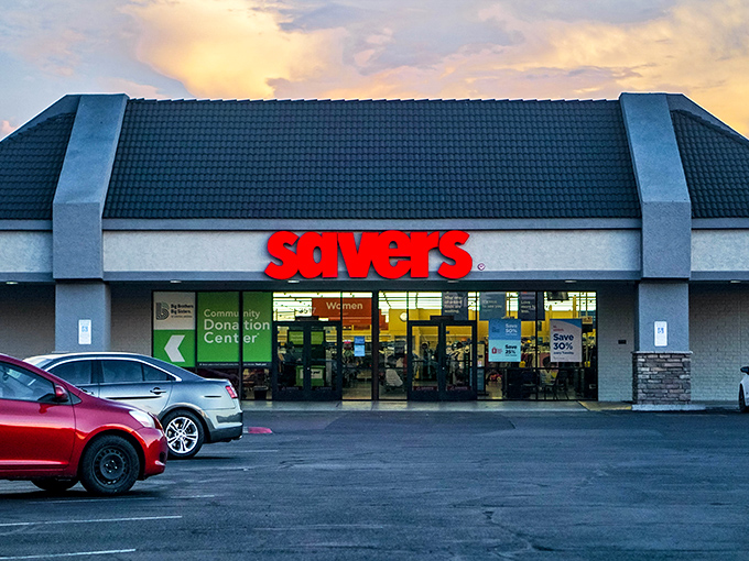 The iconic red Savers sign glows against the Arizona sunset, a beacon of bargain-hunting hope for thrifty shoppers across Phoenix.
