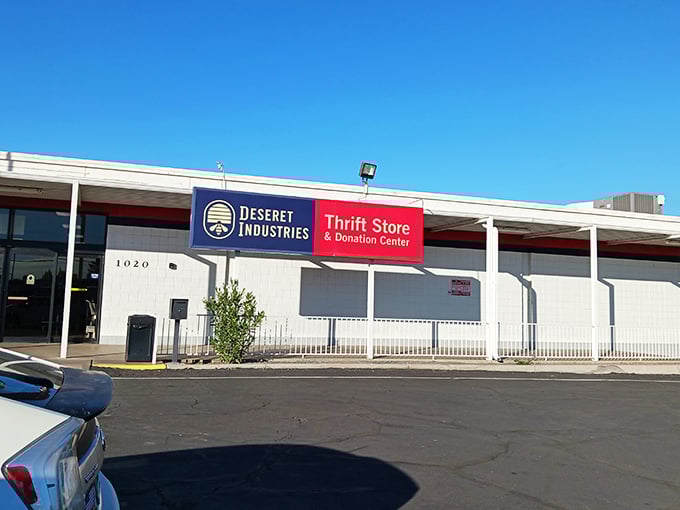 The unassuming exterior of Deseret Industries in Mesa hides a treasure trove within, like finding a secret passage in your favorite childhood book.