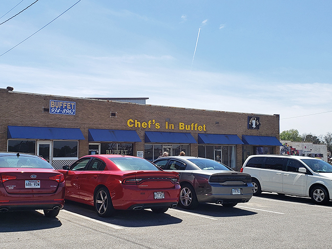 The bright blue awnings of Chef's In Downtown Cafe beckon hungry travelers like a culinary lighthouse in Jonesboro's brick-and-mortar seascape.