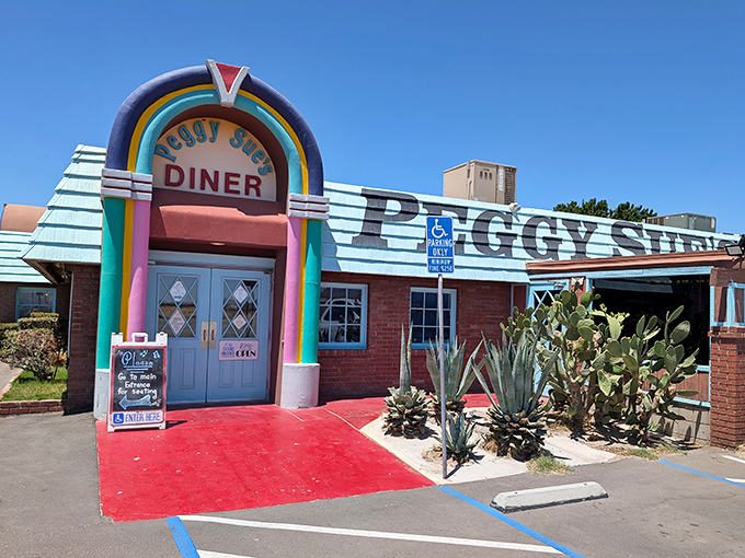 The rainbow-arched entrance to Peggy Sue's isn't just a doorway&mdash;it's a time portal disguised as the most cheerful building in the Mojave Desert.