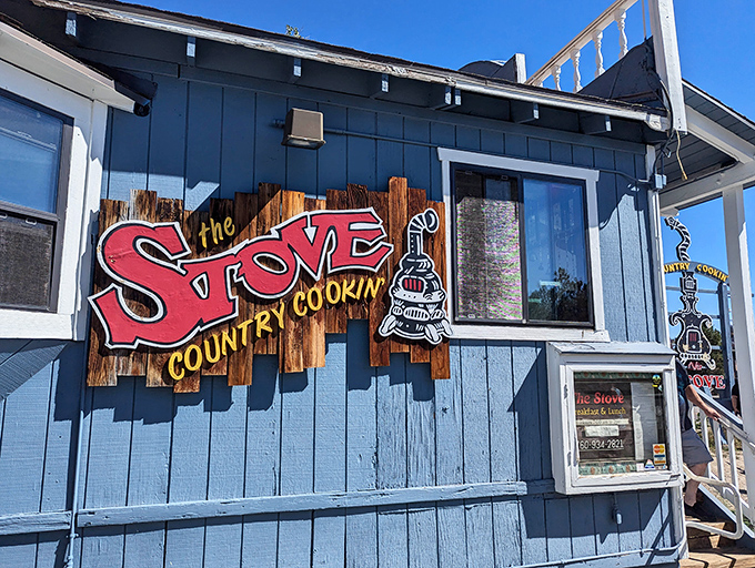 The blue exterior of The Stove stands out like a culinary beacon in Mammoth Lakes, promising country cooking that's worth the mountain drive.