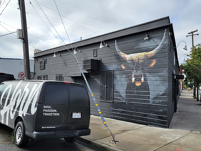 The black building with that magnificent bull mural isn't just making a statement&mdash;it's making a promise about what awaits inside.