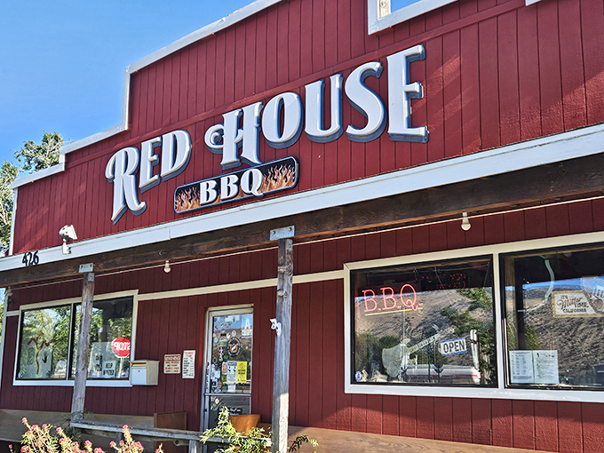 The crimson facade of Red House BBQ stands proudly against Tehachapi's blue sky, like a beacon calling hungry travelers home. No false advertising here&mdash;it's definitely red.