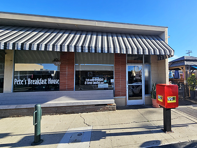 Pete's iconic blue-striped awning isn't just a sunshade&mdash;it's a beacon for breakfast pilgrims seeking salvation through perfect biscuits and gravy.