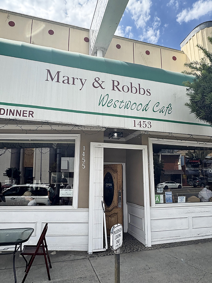 The classic green-trimmed exterior of Mary and Robb's Westwood Cafe stands as a beacon of breakfast hope in a city obsessed with avocado toast and $18 smoothies.