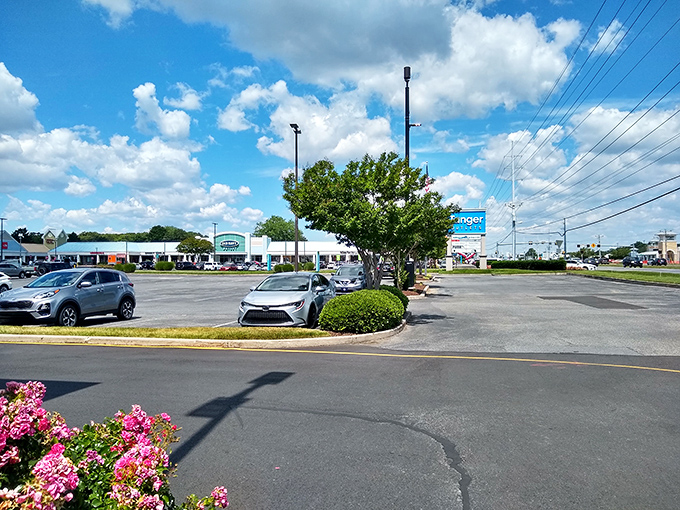 The entrance welcomes you with architecture that whispers "shopping destination" while the blue skies promise perfect bargain-hunting weather.
