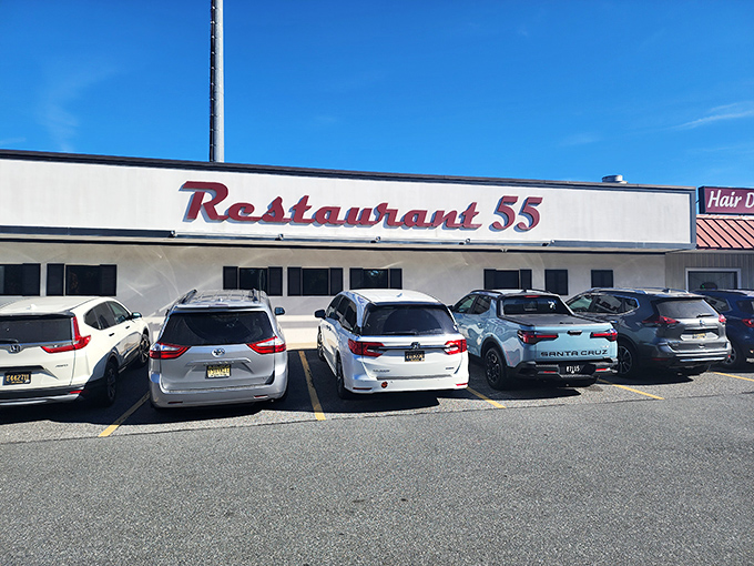 Restaurant 55's unassuming storefront hides burger greatness within, like finding a diamond in a strip mall setting. The packed parking lot tells the real story!