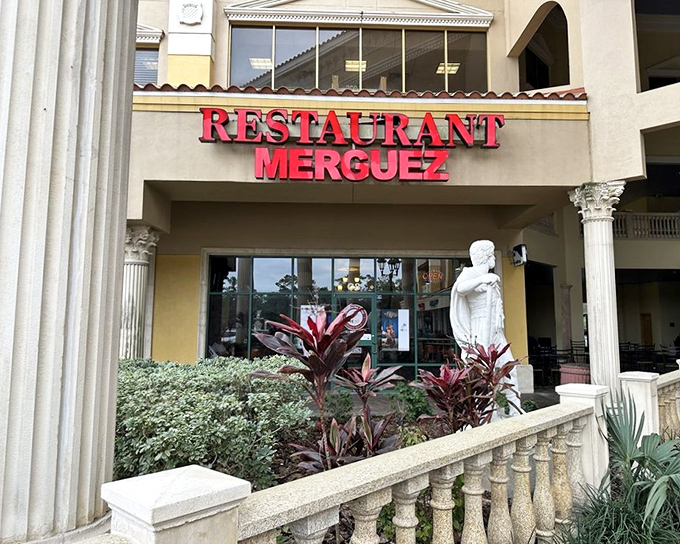 The grand entrance to Merguez Restaurant stands like a Moroccan embassy on Orlando soil, complete with classical columns and Mediterranean charm.
