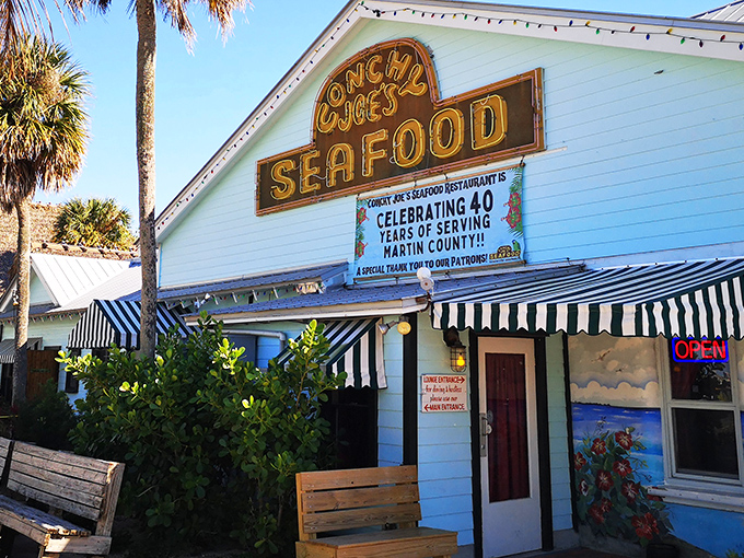 Not all treasures need buried – some just need a bright yellow sign and the promise of fresh seafood inside.