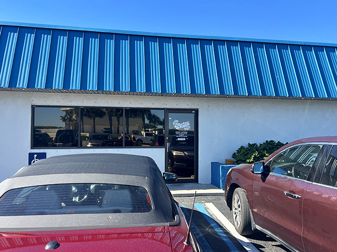 The unassuming blue-roofed exterior of The Blueberry Muffin might not stop traffic, but locals know this modest facade hides breakfast treasures worth the journey.