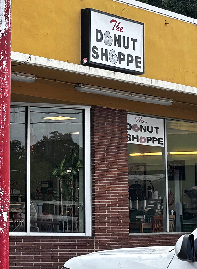 The unassuming yellow facade of The Donut Shoppe hides Jacksonville's sweetest secret. Like finding a treasure map to sugary paradise.