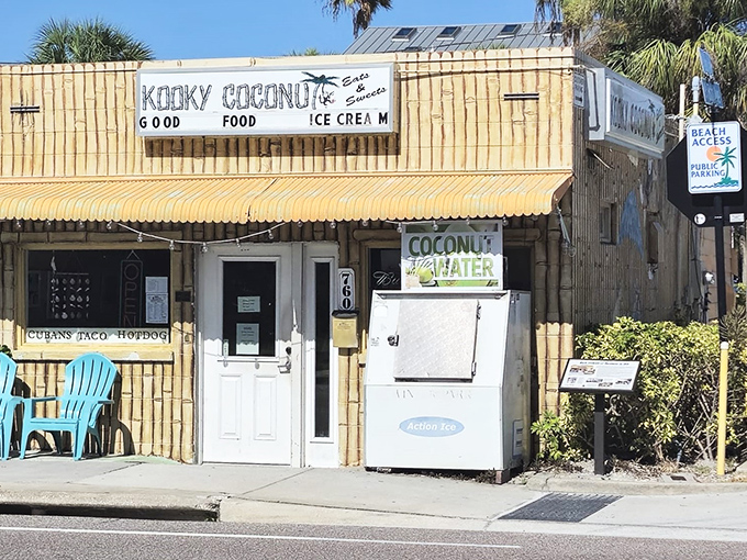 The bamboo fortress of flavor! Kooky Coconut's distinctive tiki-inspired exterior stands at the corner of 8th Avenue and Gulf Boulevard, promising tropical delights within.