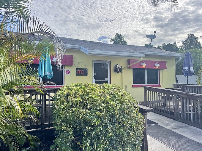 The cheerful yellow exterior of Leo's French Toast House stands out like Florida sunshine, promising comfort food that's worth the drive to Alva.