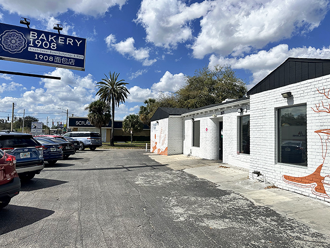 Don't judge a dumpling by its cover! This unassuming white brick building with its simple blue sign hides flavor explosions waiting to happen.