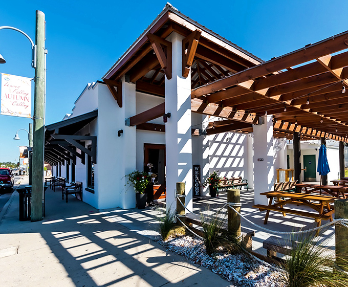 The white-washed exterior with wooden beams isn't trying to impress anyone&mdash;until you taste what's inside. Florida coastal architecture at its unpretentious best.
