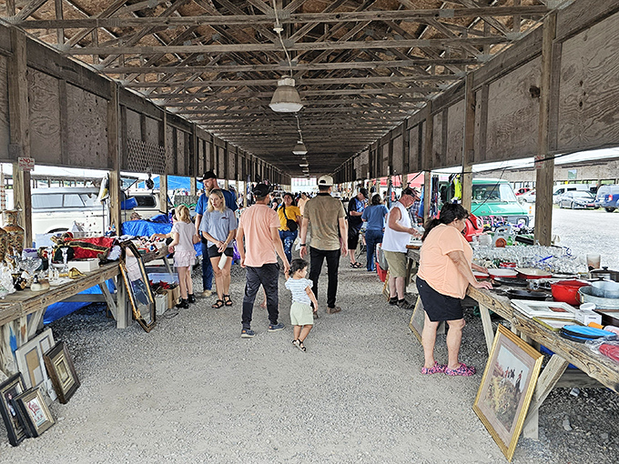 The covered walkways of Big D Flea Market stretch like treasure-filled tunnels, where one person's castoffs become another's must-haves.