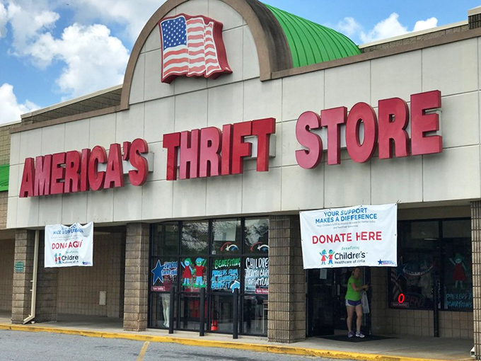 The iconic red lettering of America's Thrift Store beckons bargain hunters like a retail lighthouse in Athens.