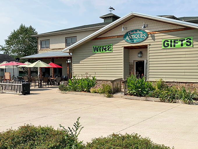 The holy trinity of retail therapy: antiques, gifts, and wine, all under one inviting roof in North Utica. Those colorful patio umbrellas practically whisper, "Stay awhile."