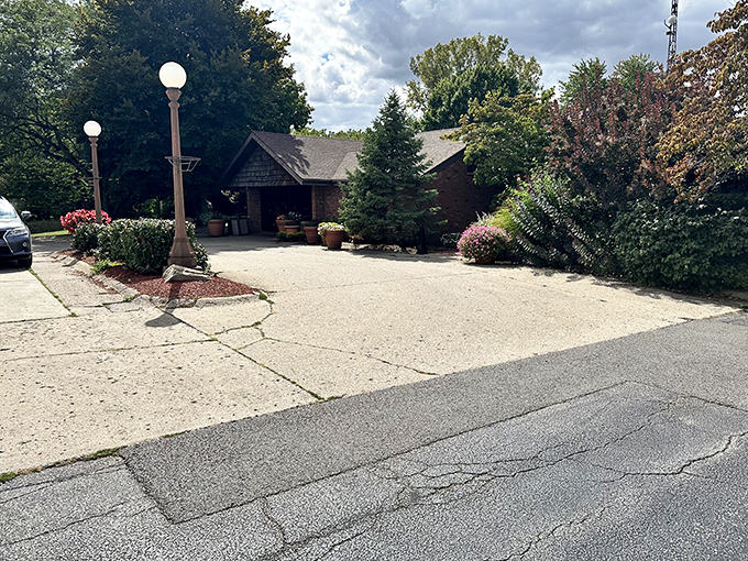 The rustic charm of The Beef House's exterior belies the culinary treasures waiting inside this unassuming roadside gem near the Indiana-Illinois border.