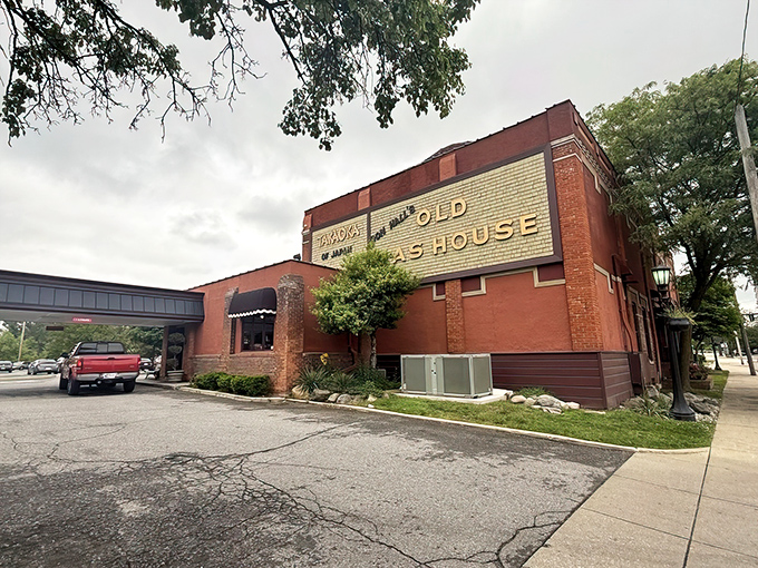 The iconic brick exterior of Fort Wayne's Old Gas House Restaurant stands as a testament to history, its vintage sign promising culinary adventures within those storied walls.