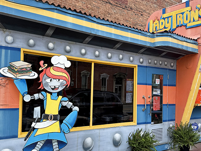 Lady Tron's colorful exterior looks like a spaceship that crash-landed in downtown New Albany and decided to serve sandwiches instead of returning home.