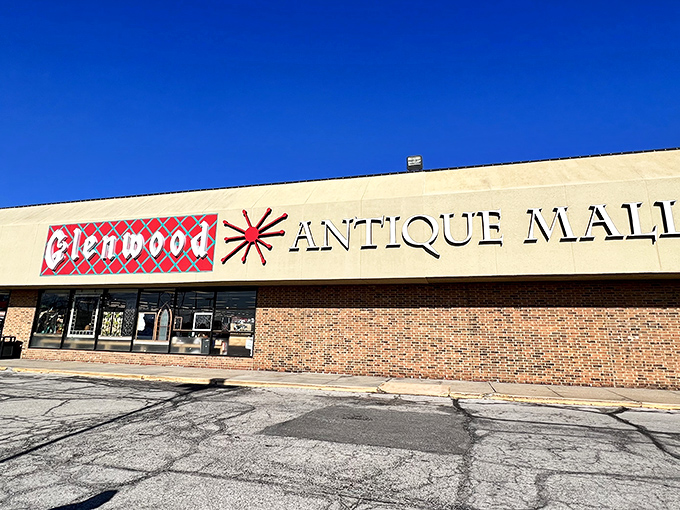The retro red diamond logo against cream-colored brick promises treasures inside like a Vegas marquee promises jackpots. Sunflower State antiquing at its finest!