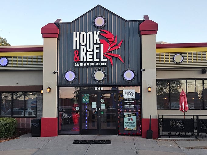 The iconic Hook & Reel facade stands like a lighthouse for seafood lovers in landlocked Kansas.