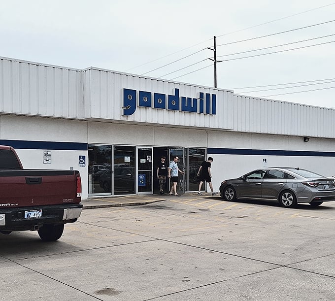 Look at this palace of possibilities! The bright blue sign beckons all bargain hunters to this Kansas Goodwill. Time to snag some vintage gold.