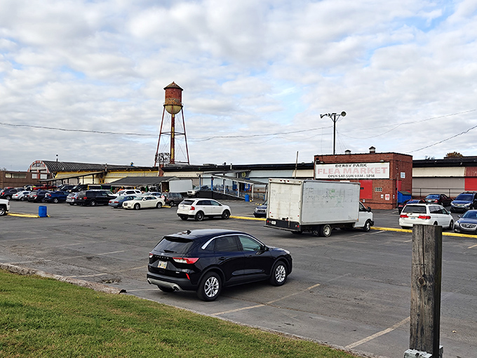 The iconic water tower stands sentinel over Derby Park Flea Market, where weekend treasure hunters gather like modern-day archaeologists with coffee cups instead of brushes.