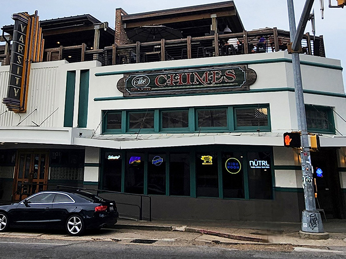 The iconic fa&ccedil;ade of The Chimes stands proudly on Highland Road, beckoning hungry Tigers fans and foodies alike with its distinctive neon signage.