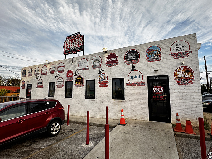 The wall of fame doesn't lie! Chaps Pit Beef's white brick exterior proudly displays its impressive collection of accolades like a barbecue hall of fame.