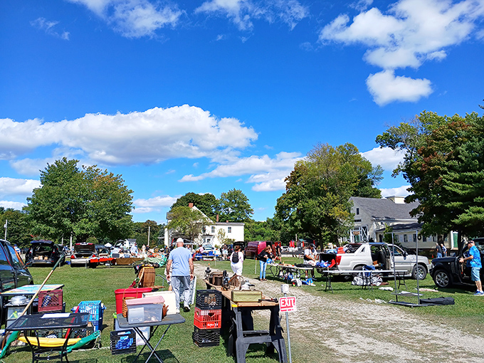 Under New England's perfect blue skies, treasure hunters navigate a maze of tables where yesterday's castoffs become tomorrow's conversation pieces.