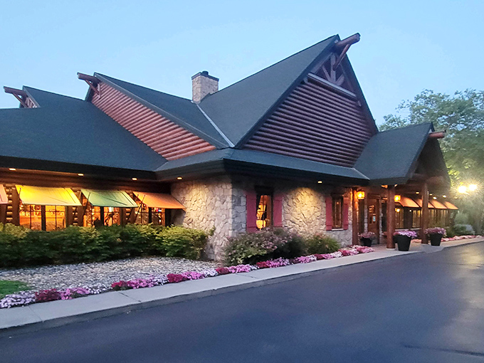 Evening glow transforms this lodge into the coziest corner of Michigan, complete with nature's own welcome mat.