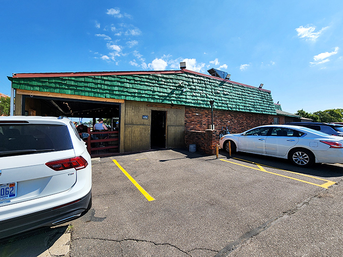 The unmistakable green-shingled roof and brick exterior announce you've arrived at Detroit's slider paradise. No fancy frills needed.
