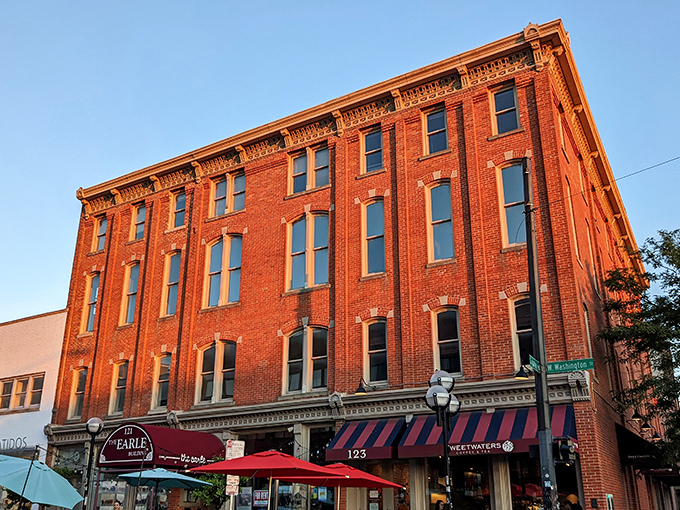 The historic brick fa&ccedil;ade of The Earle stands proudly on Washington Street, a culinary landmark in Ann Arbor's downtown scene.